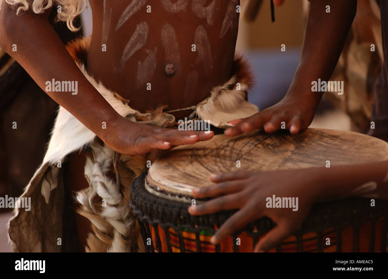 Drum playing africa hi-res stock photography and images - Alamy