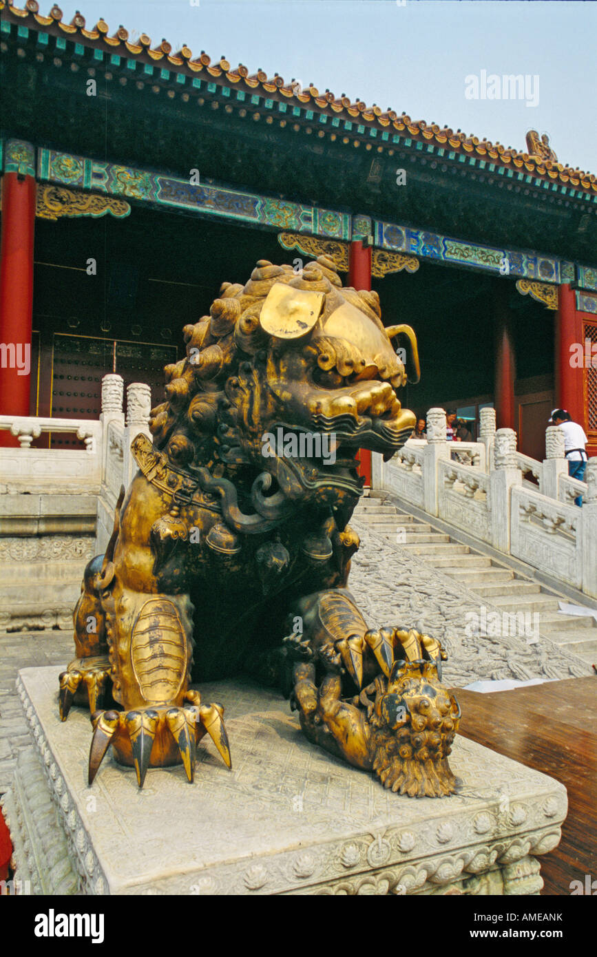 lion statue (qi lin) and building, forbidden city Stock Photo - Alamy