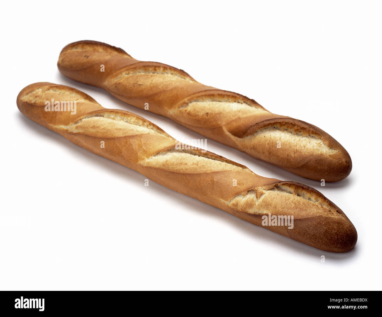 Two long French baguettes on a white background Stock Photo - Alamy