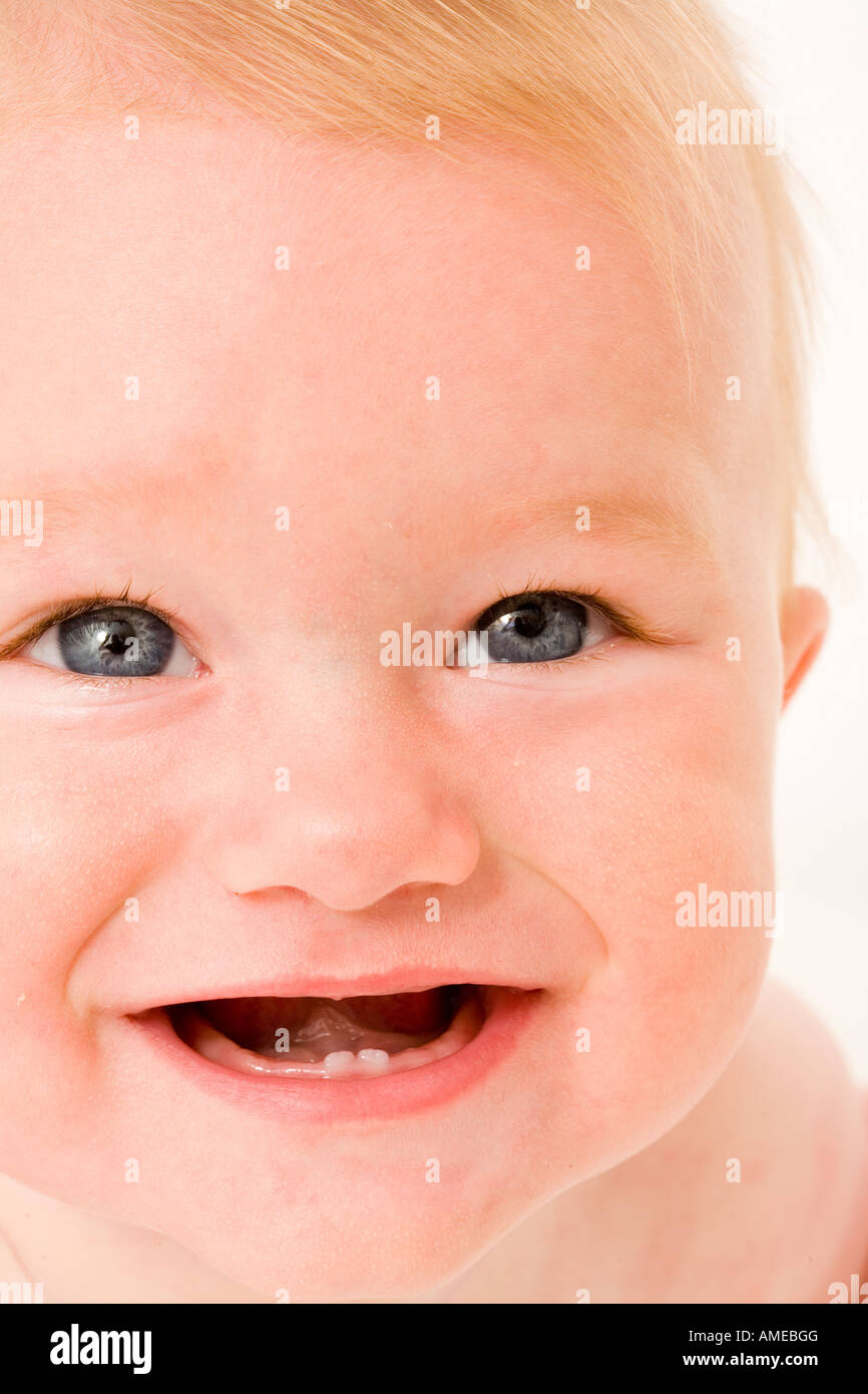 Baby Showing Her First Teeth Stock Photo - Alamy