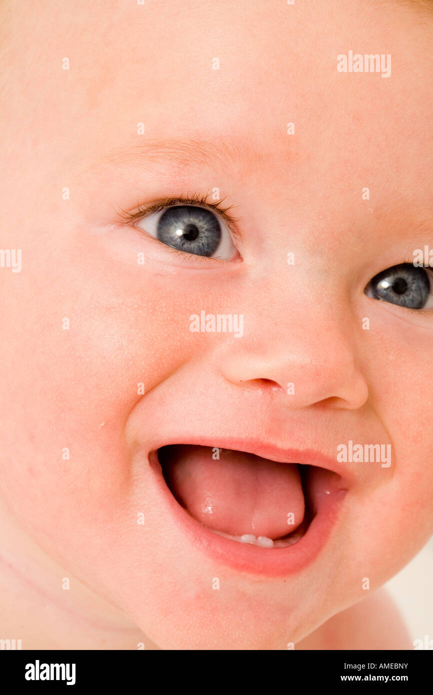 Baby Showing Her First Teeth Stock Photo - Alamy