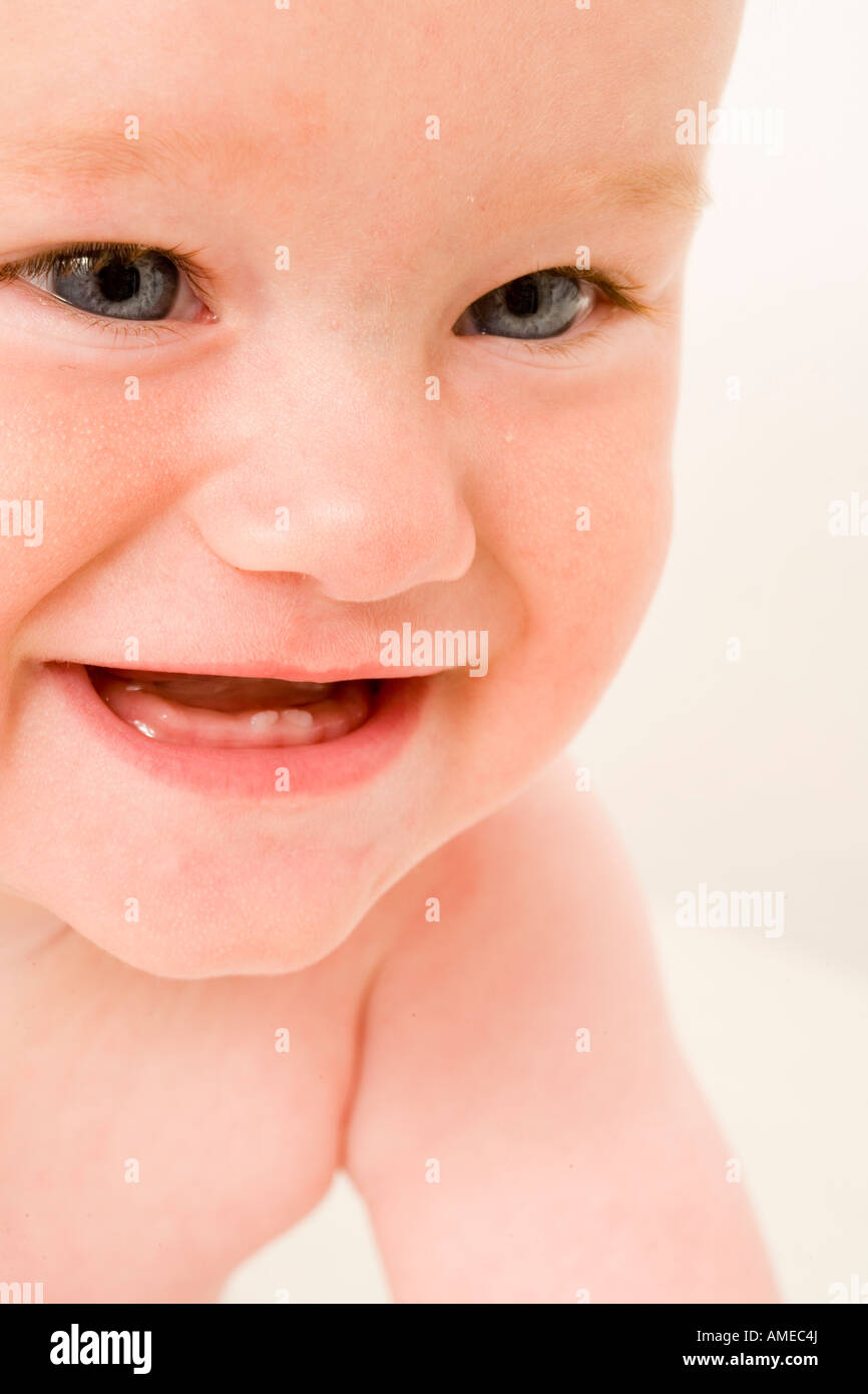 Baby Showing Her First Teeth Stock Photo - Alamy