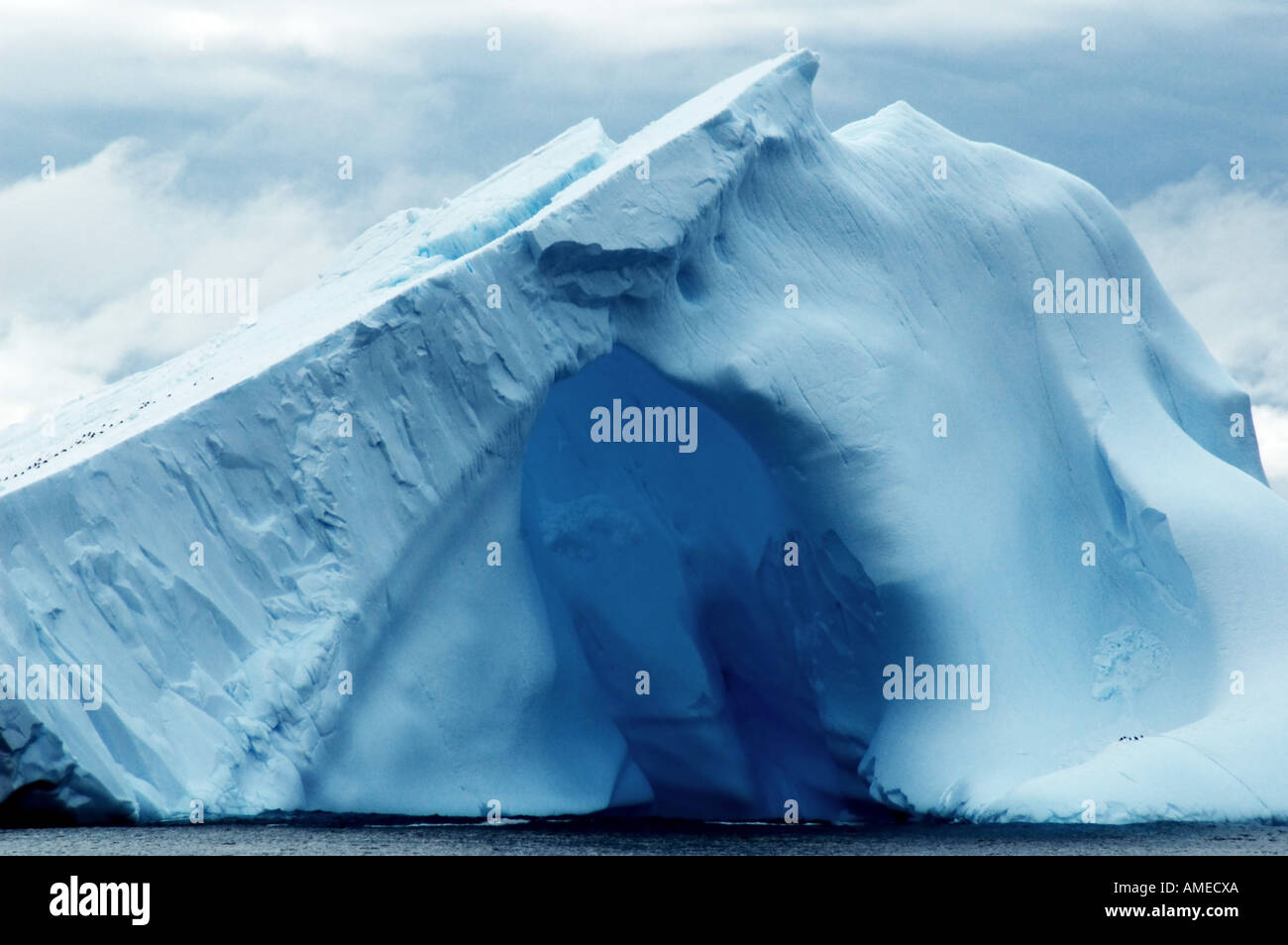 Skewed iceberg with cave hi-res stock photography and images - Alamy