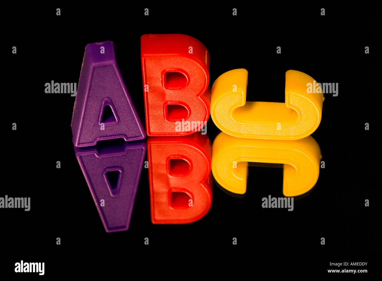 Educational magnetic letters with reflection Stock Photo - Alamy