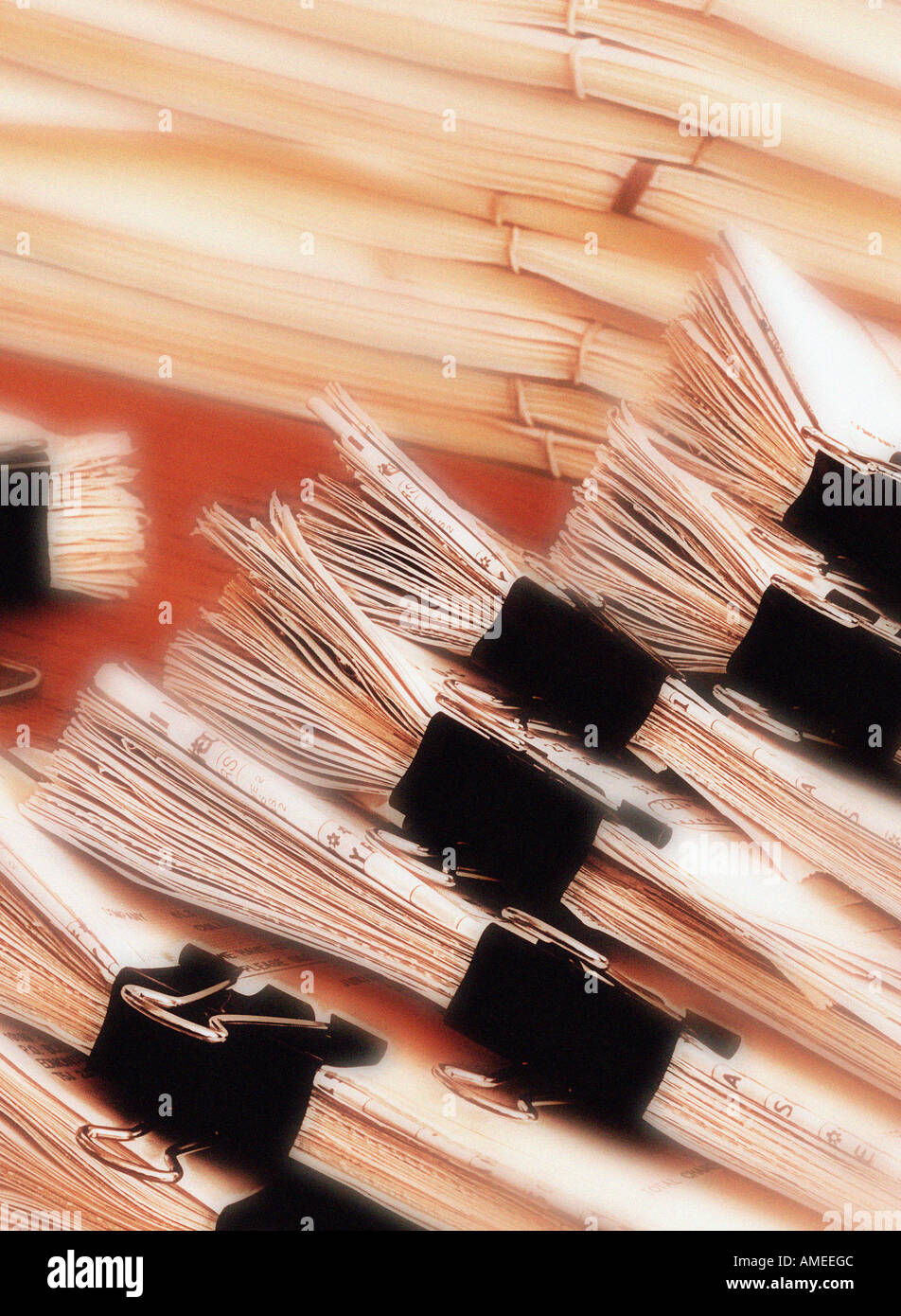 Close-Up of Paper Clipped with Binder Clips Stock Photo - Alamy