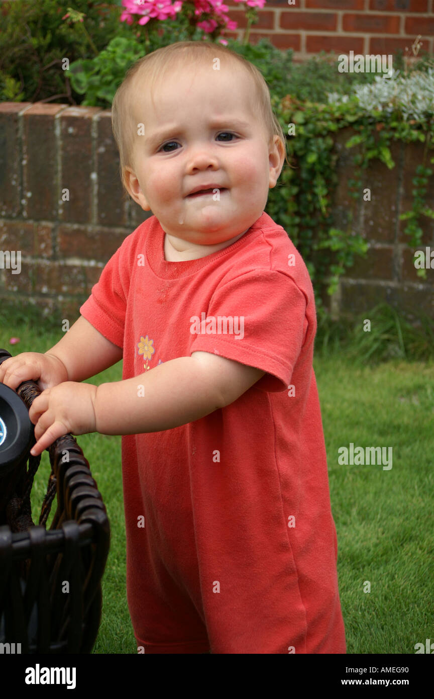 Beautiful Baby Girl Standing Stock Photo - Alamy