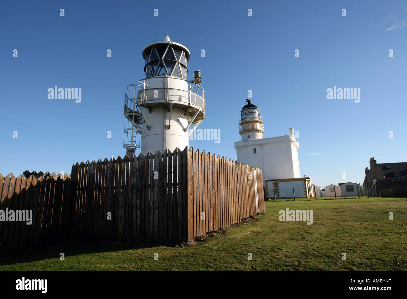 The old (background) and new (foreground) lighthouses at Kinnaird head ...