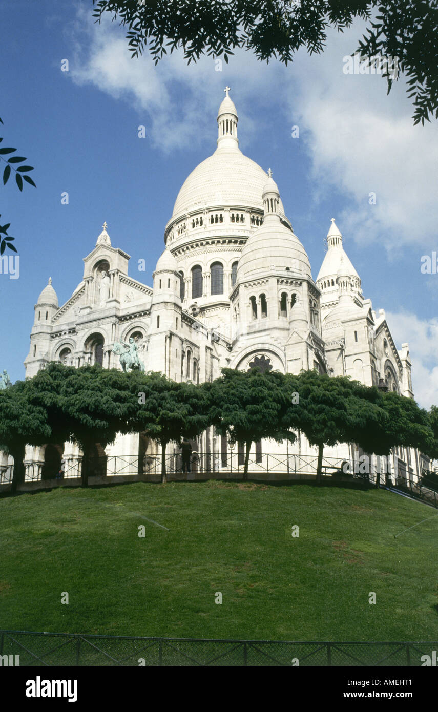 The white basilica of Sacre Coeur completed in 1914 and consecrated ...