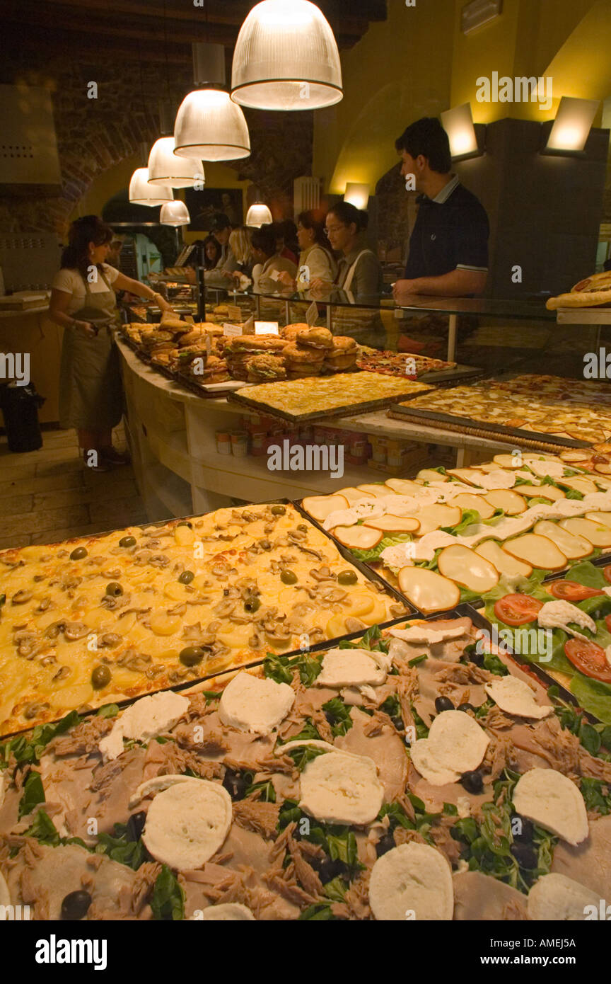 Local lunchtime foods in traditional delicatessen Bergamo Alta old ...
