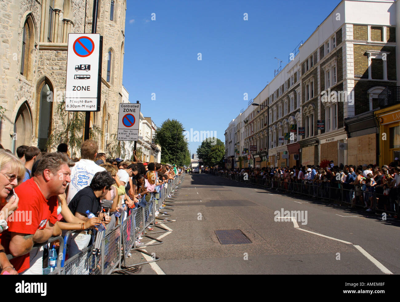 Crowds behind barriers hi-res stock photography and images - Alamy