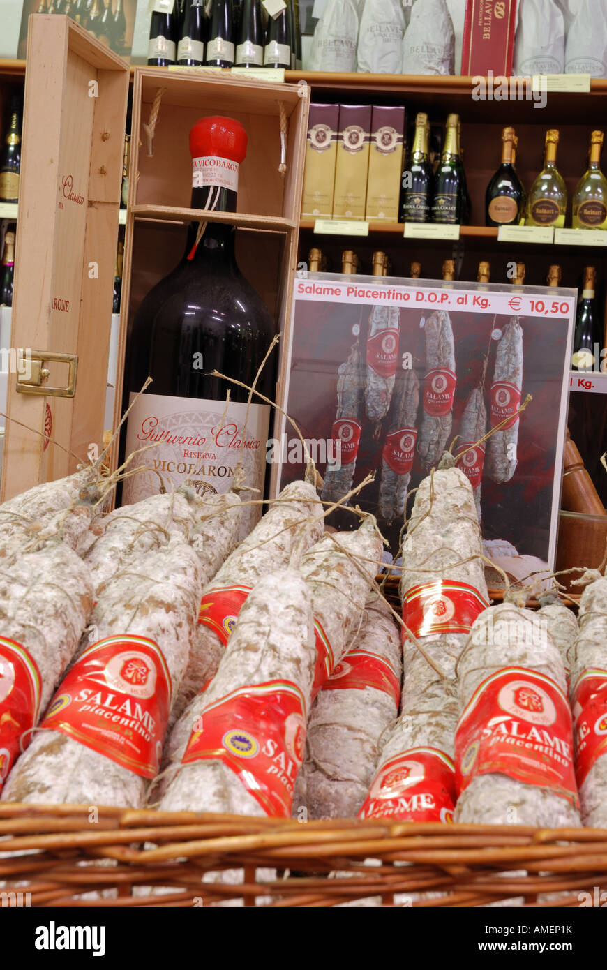 A selection of salumi and wine on display in a shop in Italy Stock ...