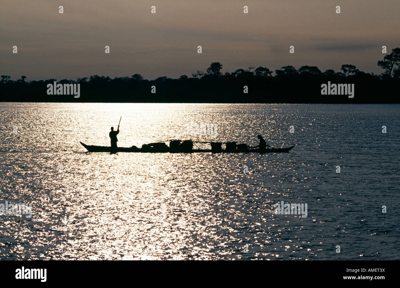 Boat at sunrise on the Brahmaputra river near Dibrugarh, Assam, India ...