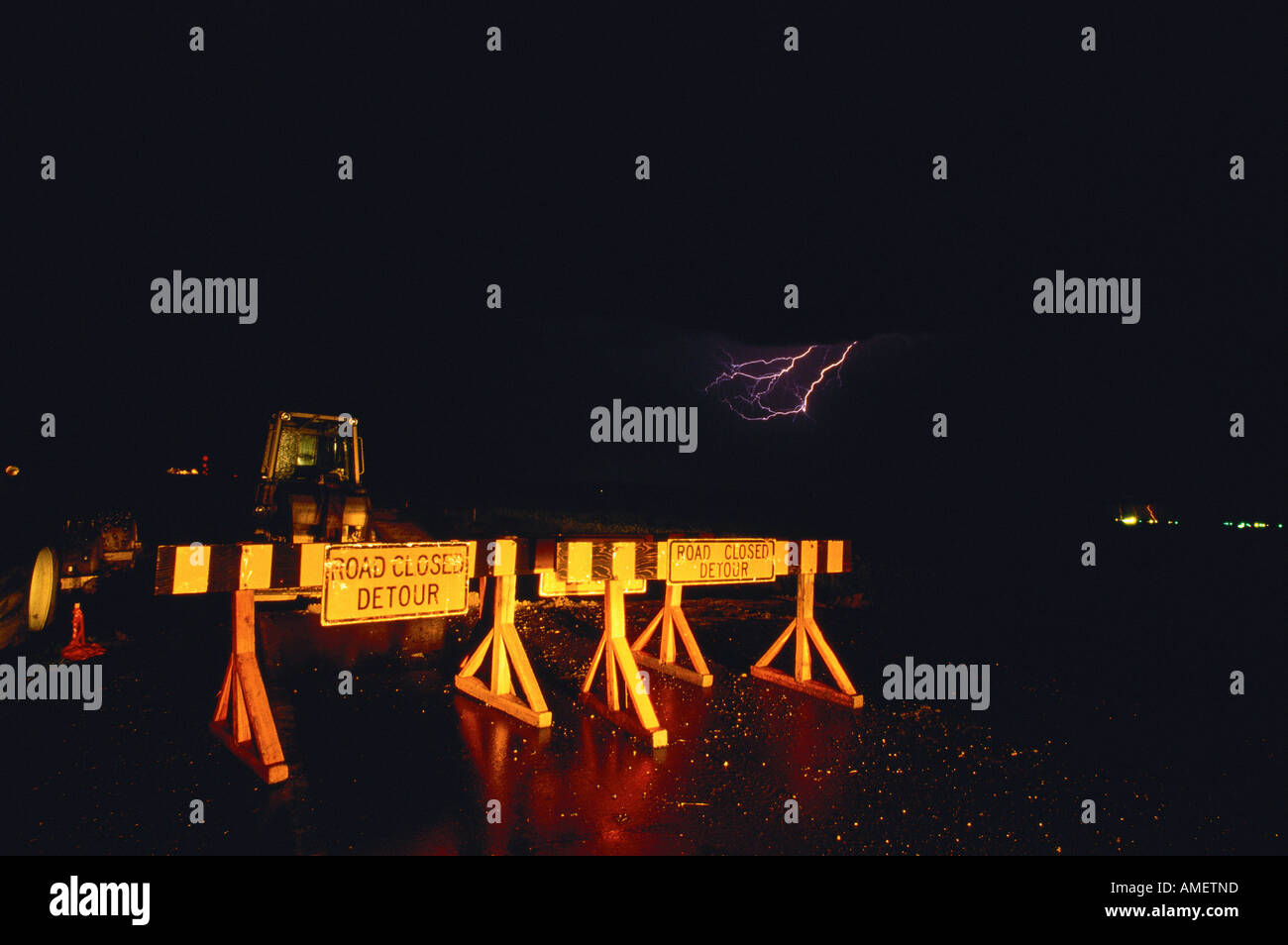 Closed Road and Lightning at Night Stock Photo - Alamy