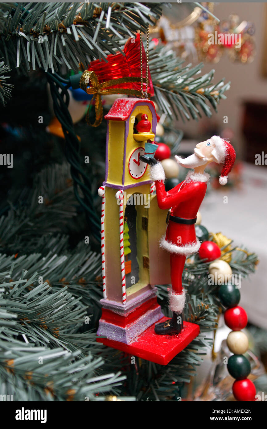 Christmas tree ornament - Santa feeds the Bird in a Cuckoo Clock Stock ...