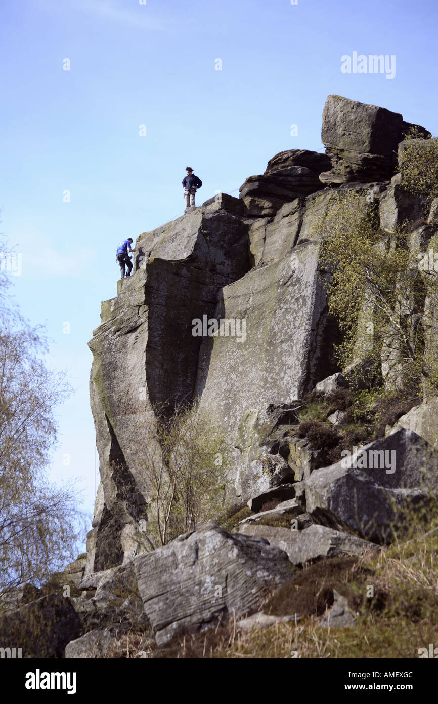 People climbing on the rocks at Curbar Edge in the Peak District ...