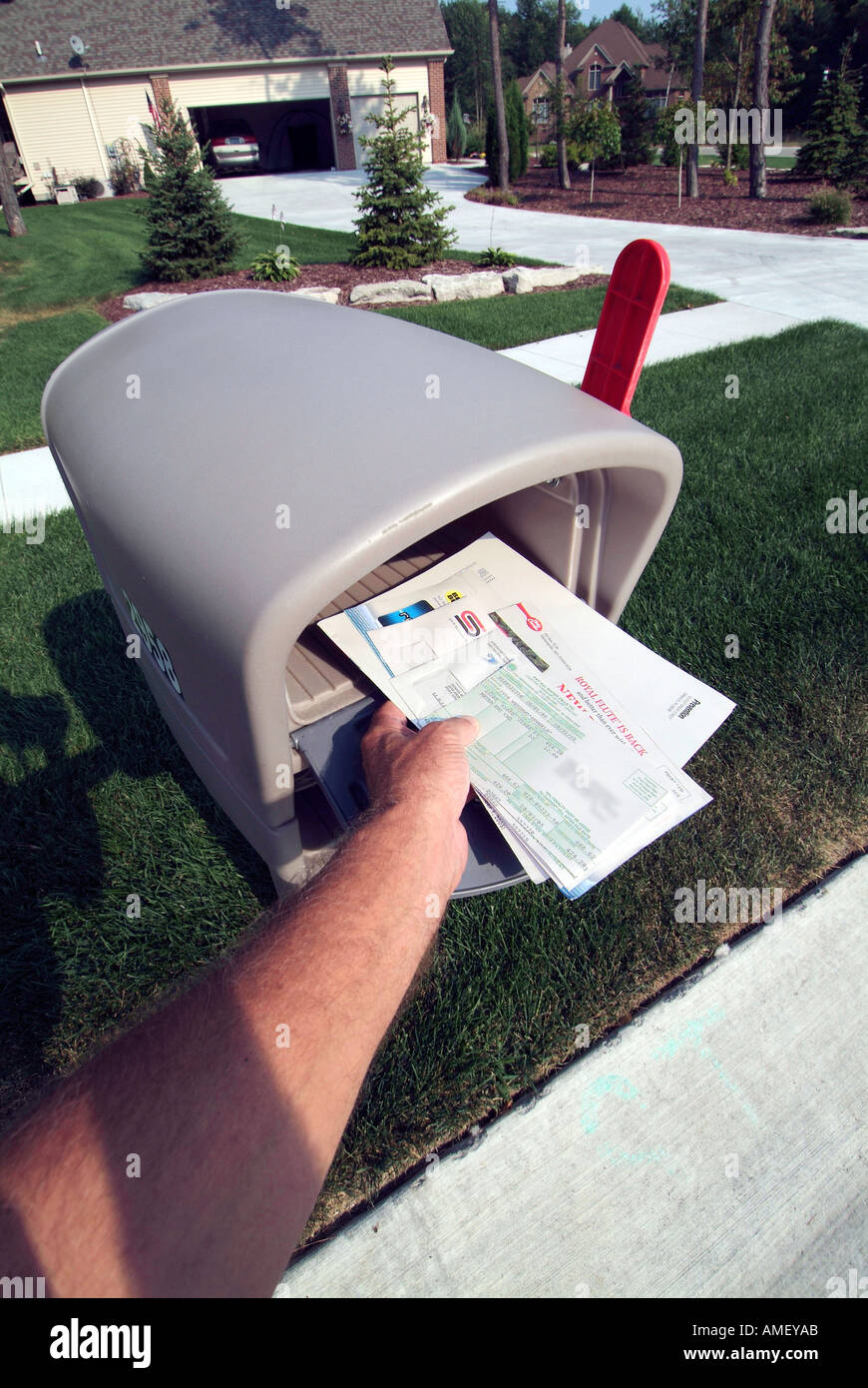 Mailbox with letters bills statements of communication Stock Photo - Alamy