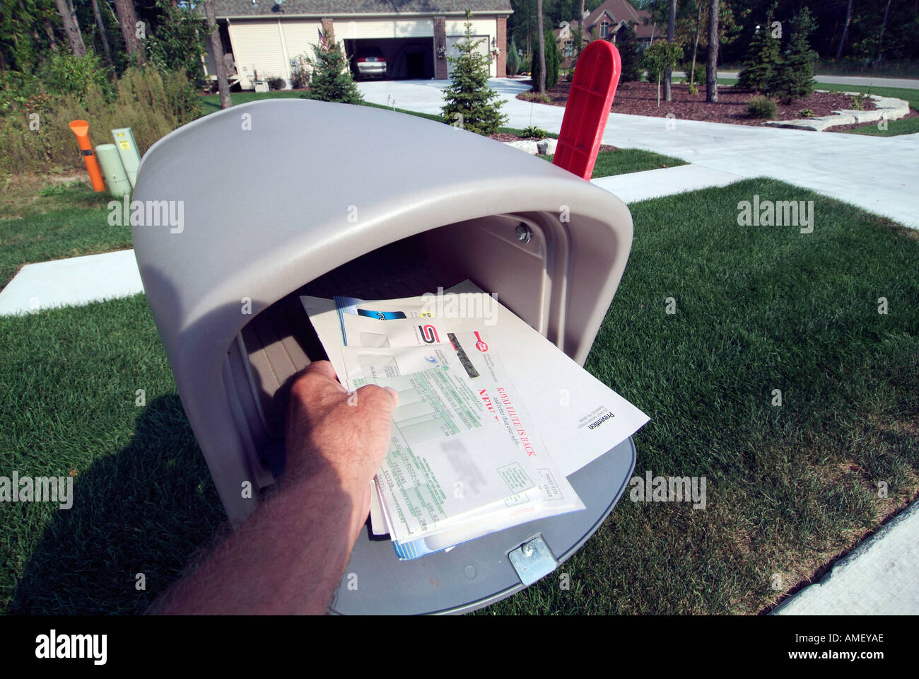 Mailbox with letters bills statements of communication Stock Photo - Alamy