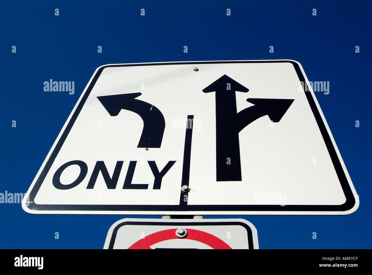curved arrows on a street directional sign showing different directions ...