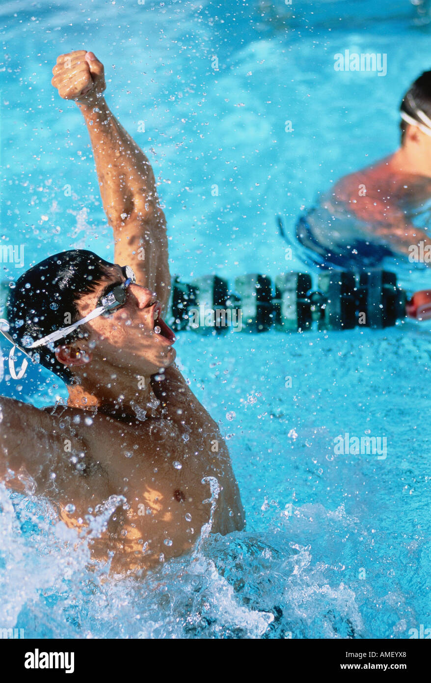 Man Winning Swimming Competition Stock Photo - Alamy