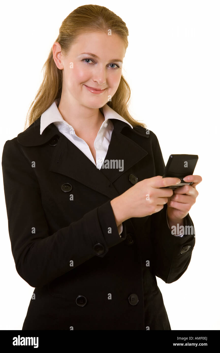 Smiling woman texting Stock Photo - Alamy