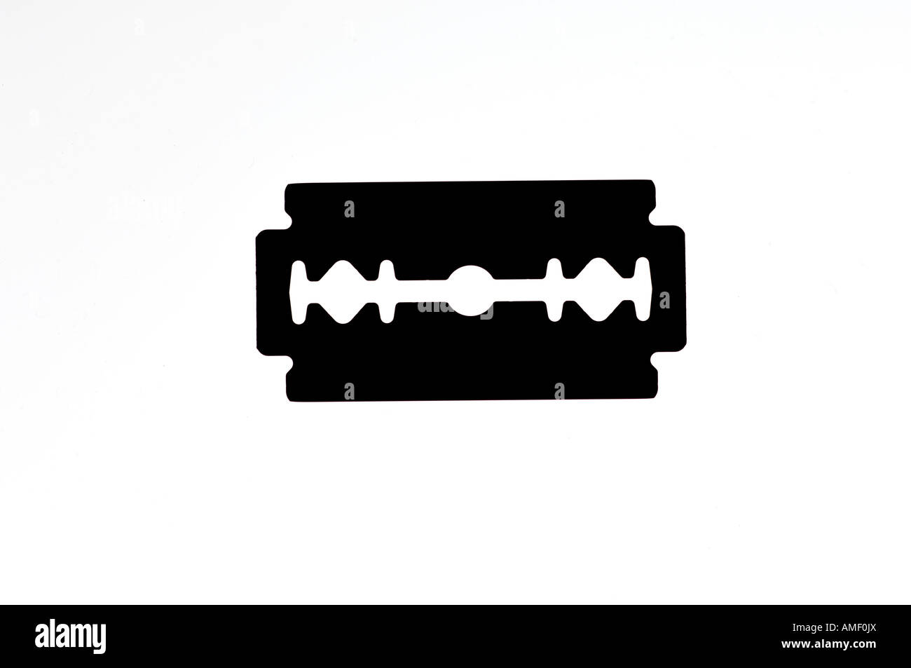 Silhouette of a traditional razor blade against a white background ...