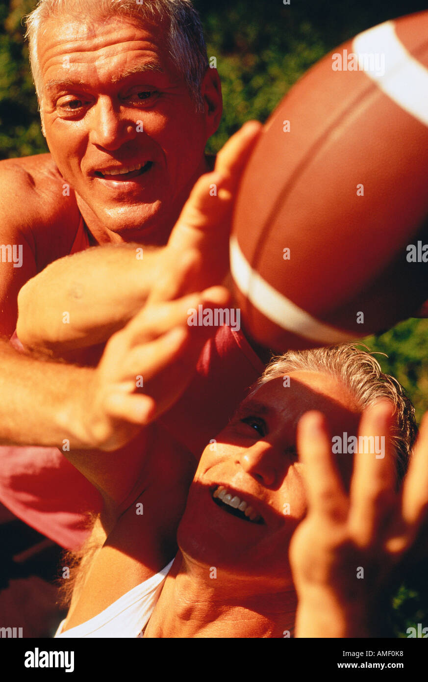 Old aged playing football hi-res stock photography and images - Alamy