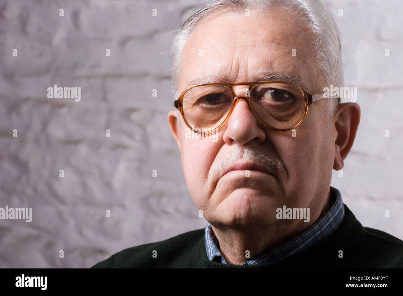 Face of a serious tough old man Stock Photo, Royalty Free Image ...