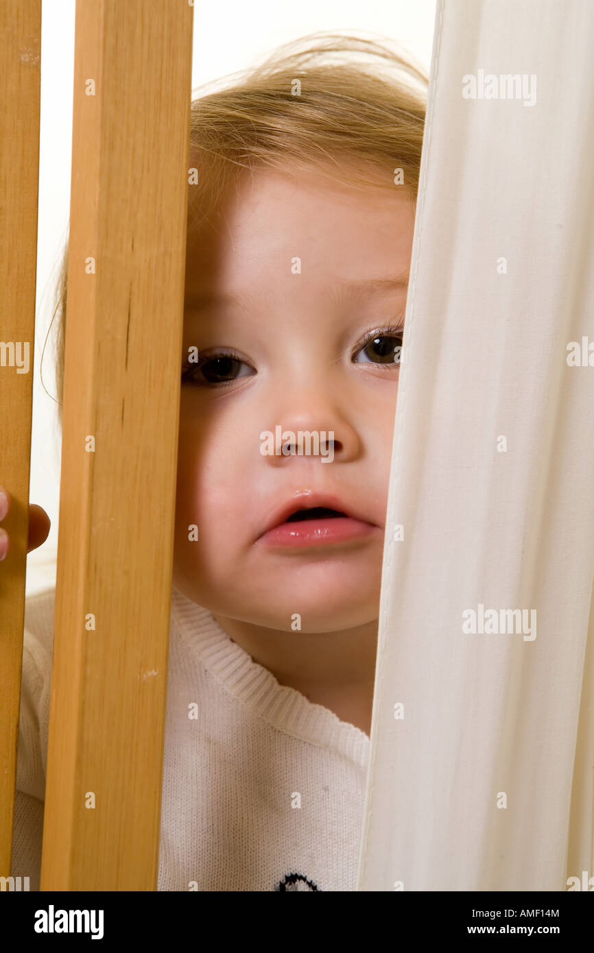 Child peek through window hi-res stock photography and images - Alamy