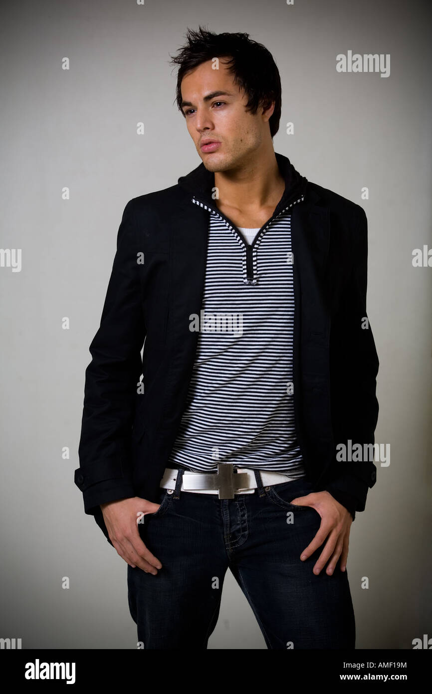 Young man posing Stock Photo - Alamy