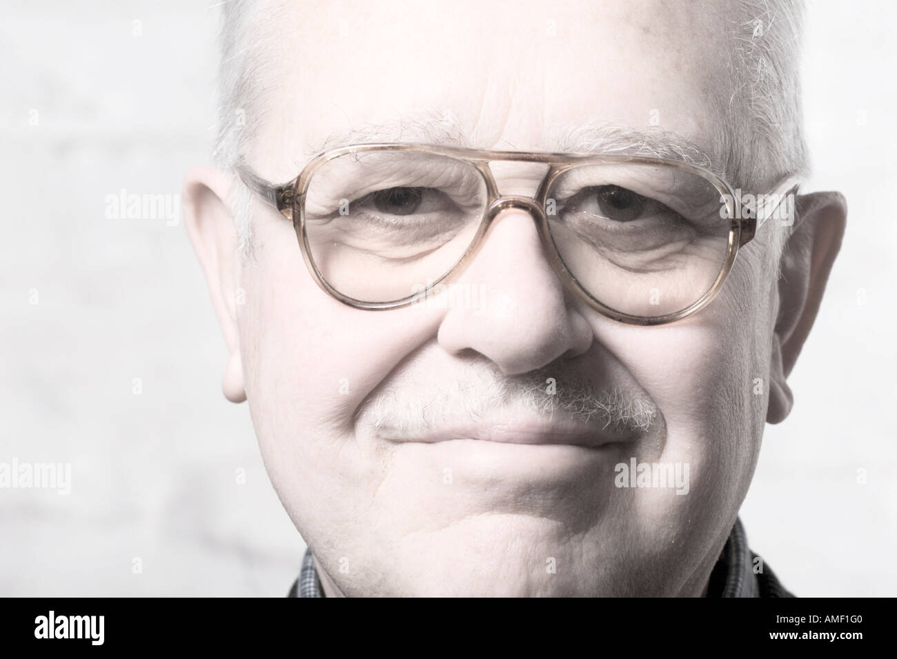 Face of an old man smiling (desaturated Stock Photo - Alamy