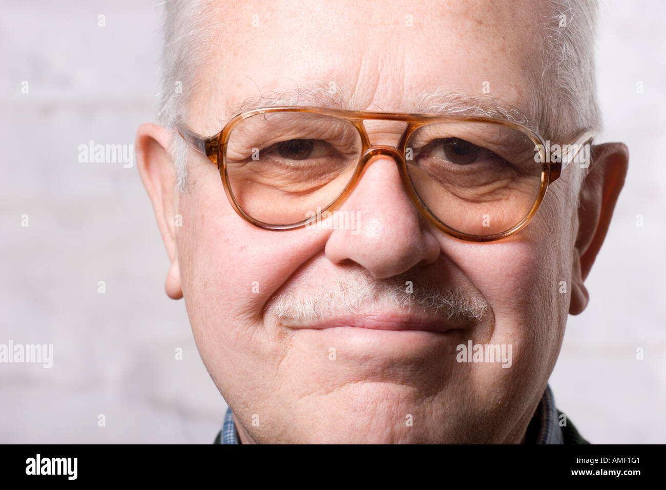 Face of an old man smiling Stock Photo - Alamy