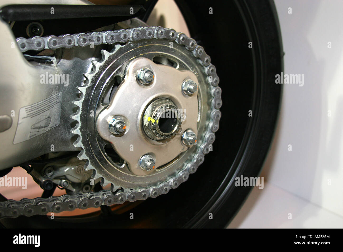 Rear cog and chain on modern motor cycle Stock Photo - Alamy