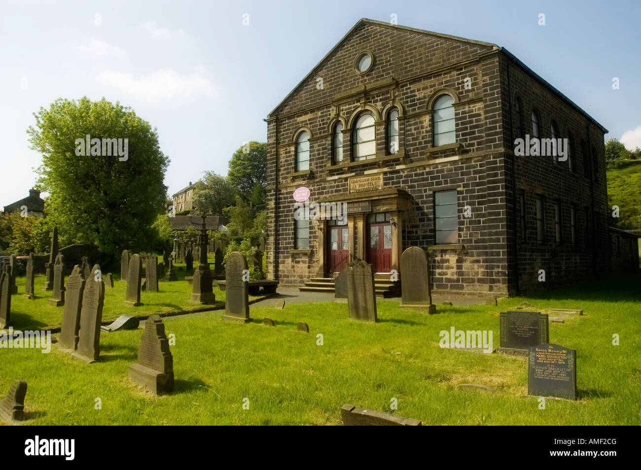 Small country church and graveyard Denholme West Yorkshire Stock Photo ...