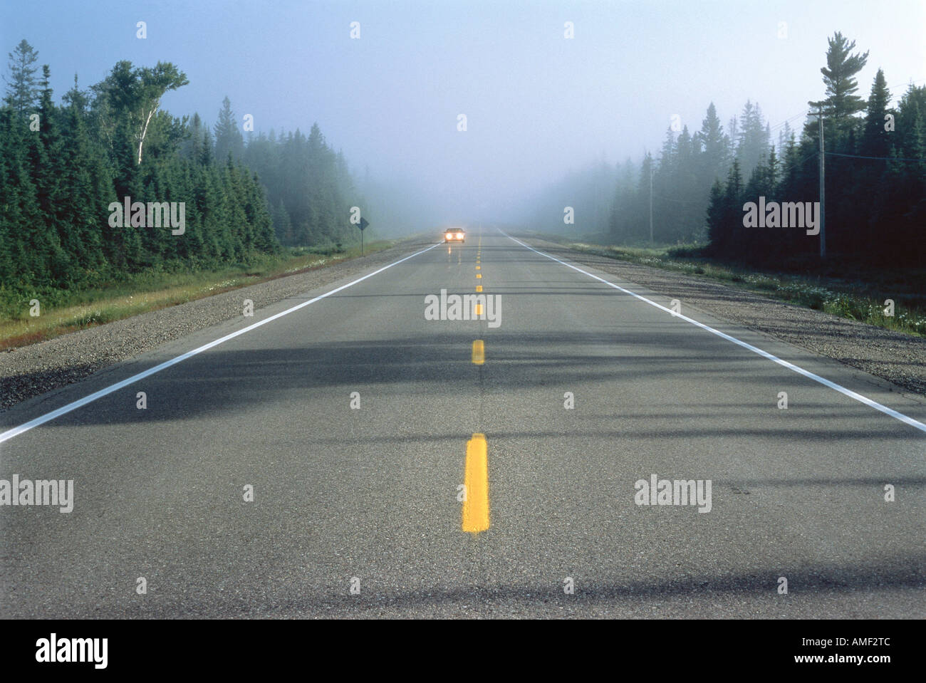 Car on Road with Haze Highway 17, Ontario, Canada Stock Photo - Alamy