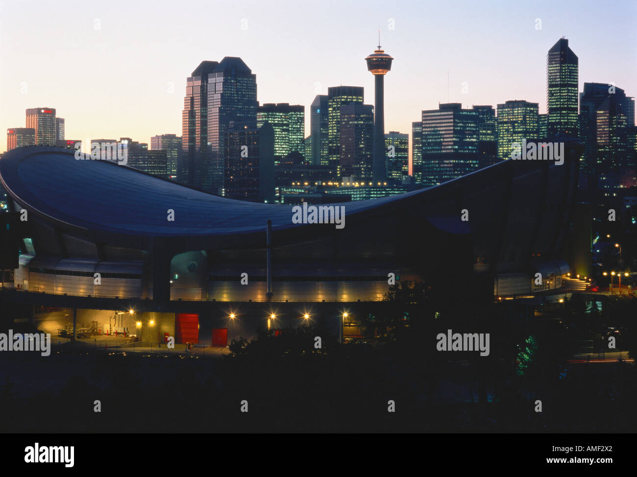 Saddle Dome and City Skyline at Dusk Calgary, Alberta, Canada Stock ...