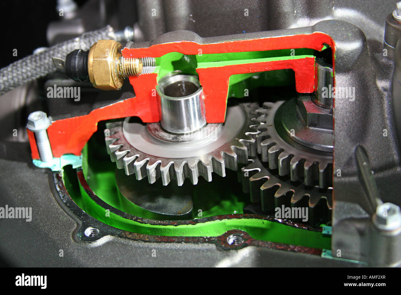 Cut away section model of gears and cogs on a motor cycle engine at NEC ...
