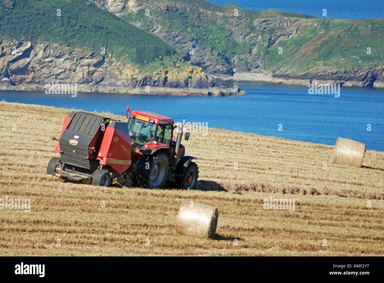 Cornish coastal summer agricultural scene of golden fields blue sea and ...
