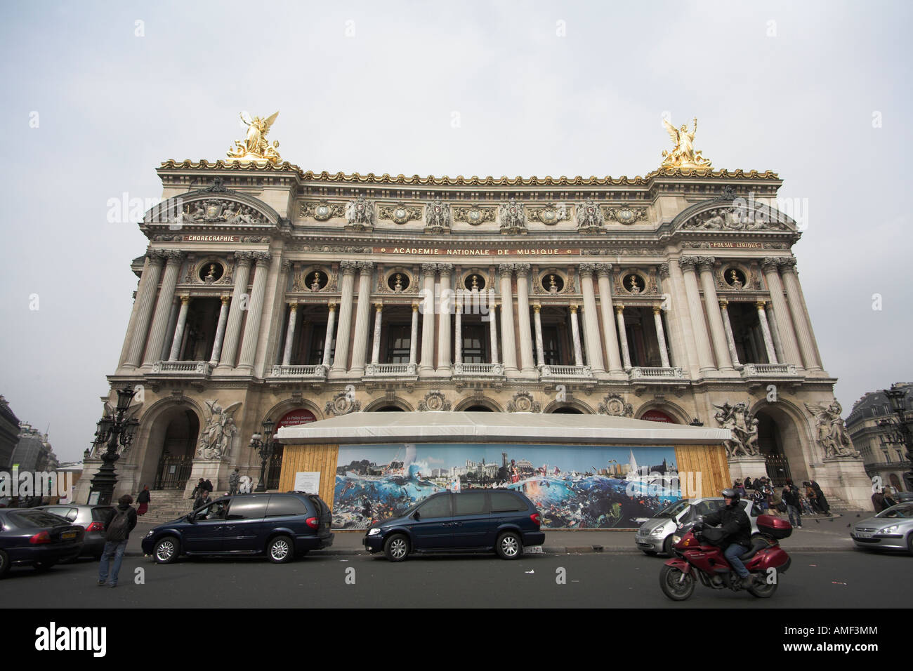 L'opera paris france opera house undergoing renovation behind decorated ...