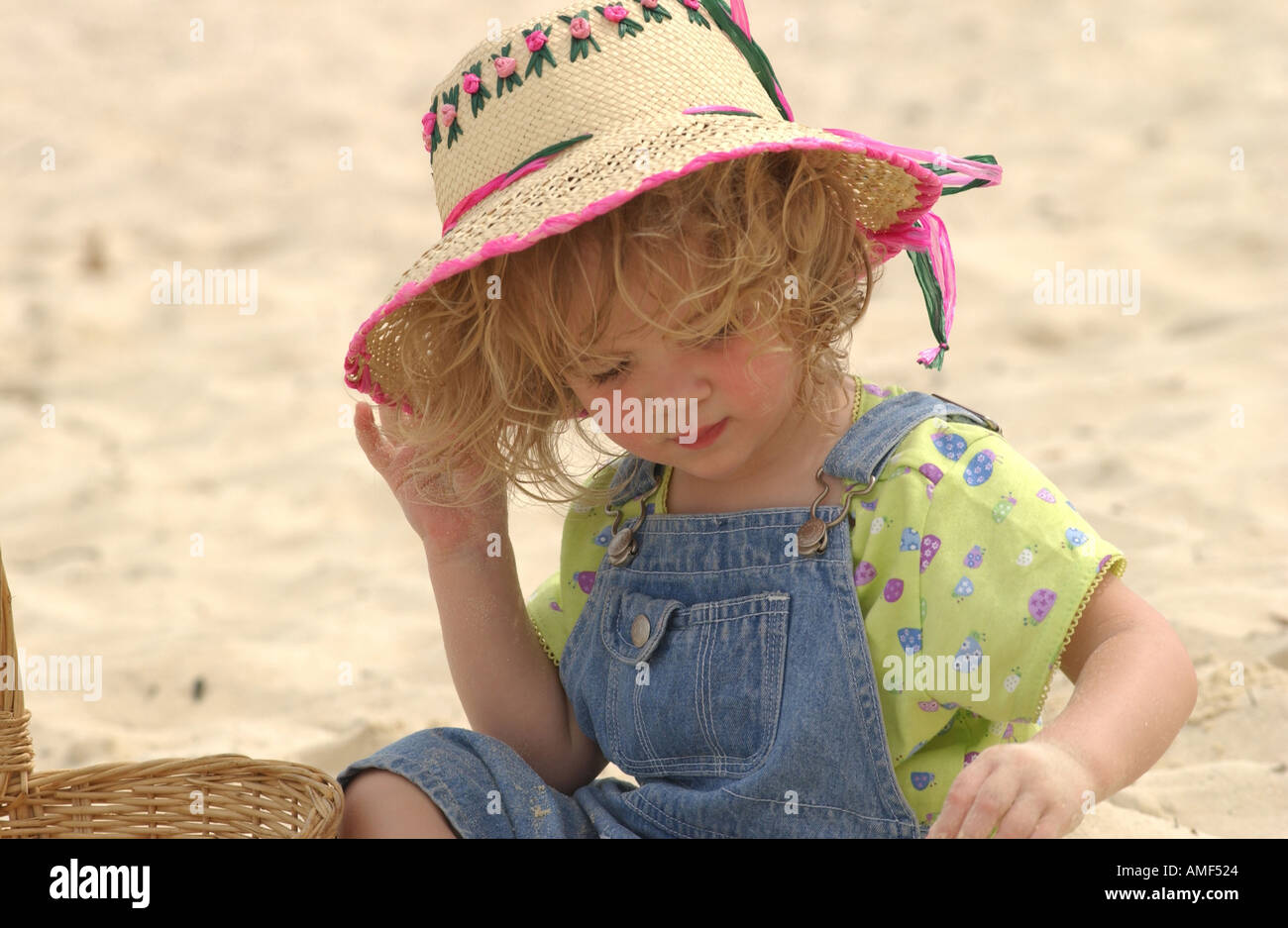 Children playing outside and wearing hats hi-res stock photography and ...