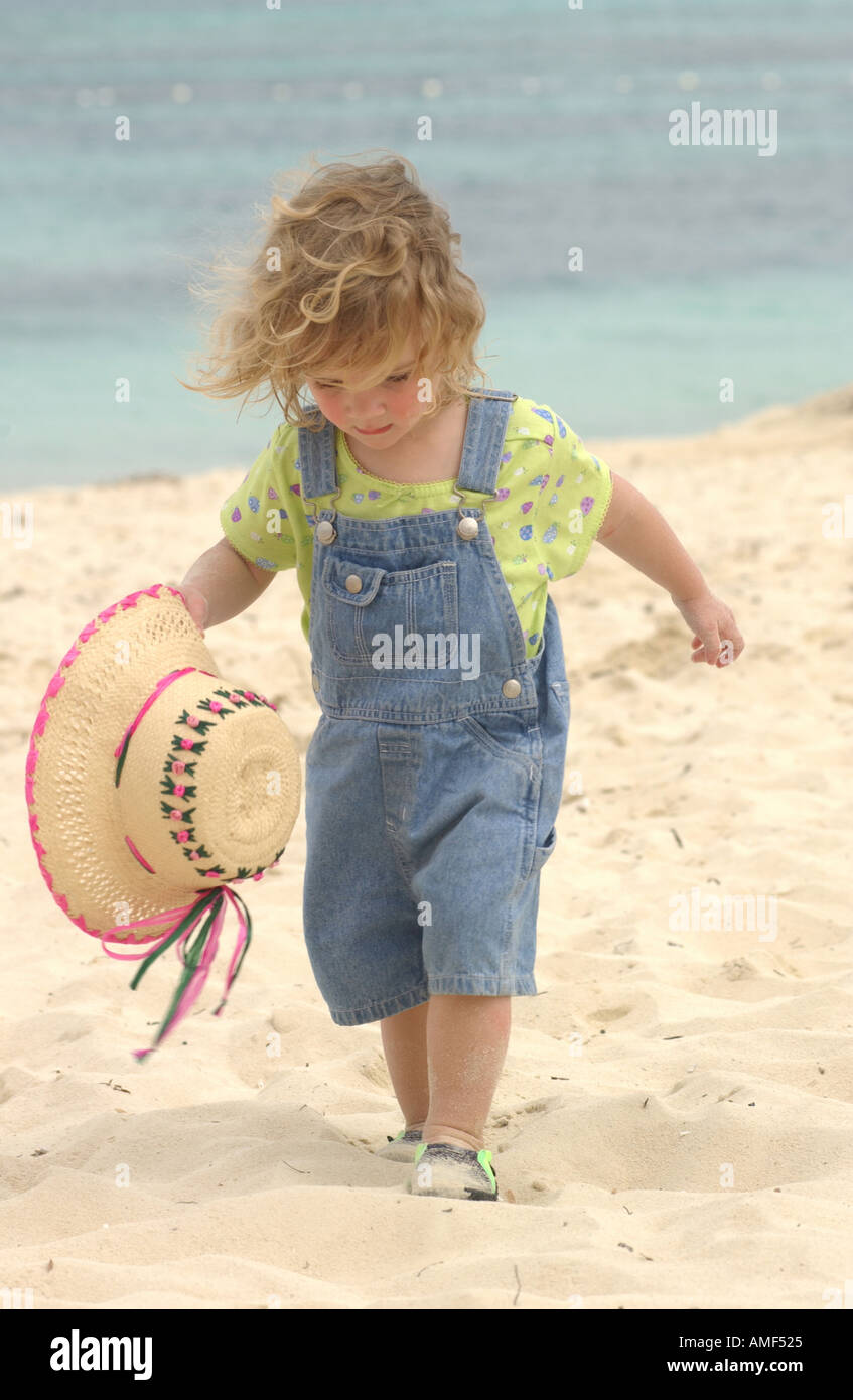 Children playing outside and wearing hats hi-res stock photography and ...