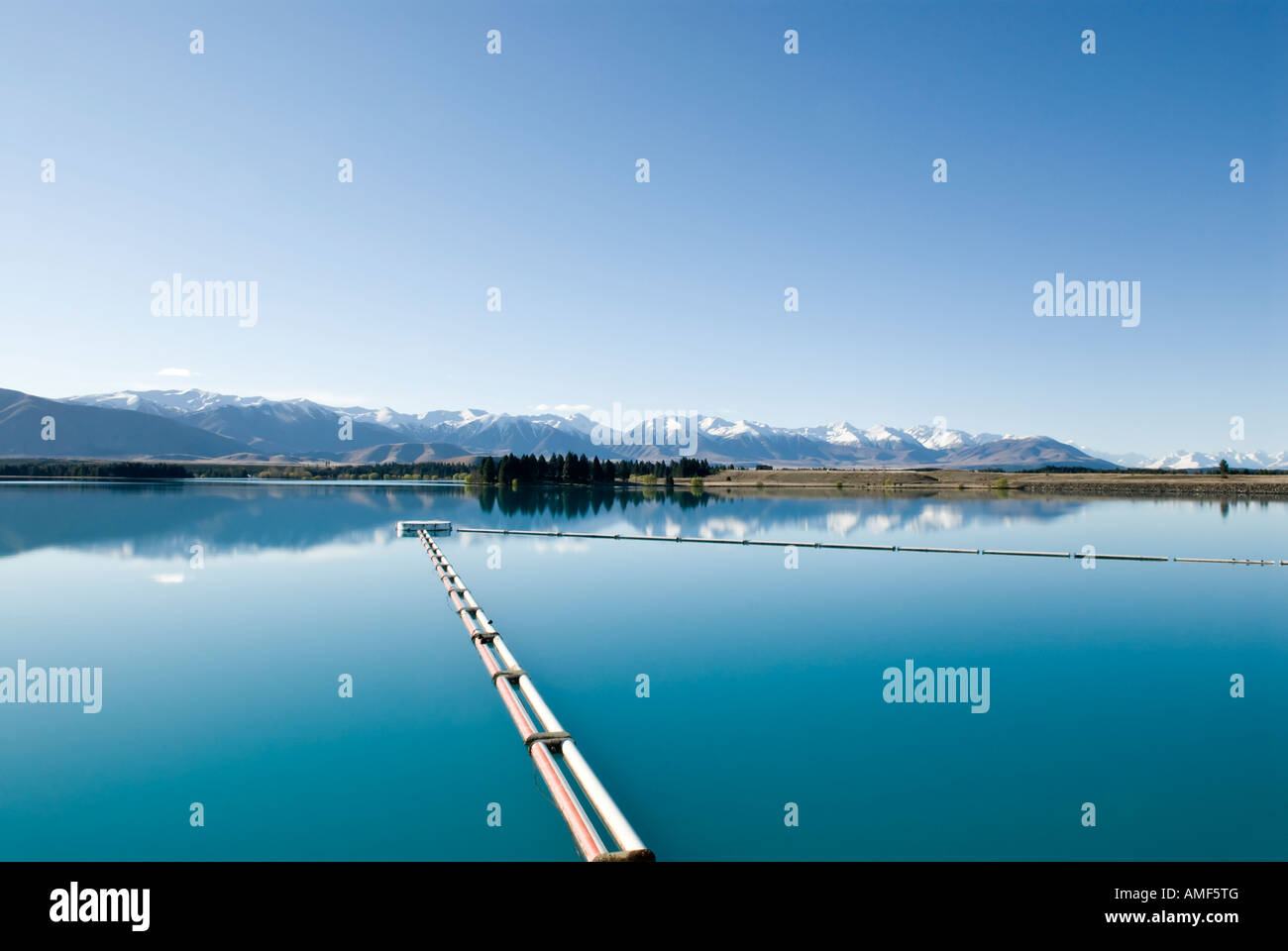 Floating boom at Lake Ruataniwha hydroelectric power spillway Stock ...
