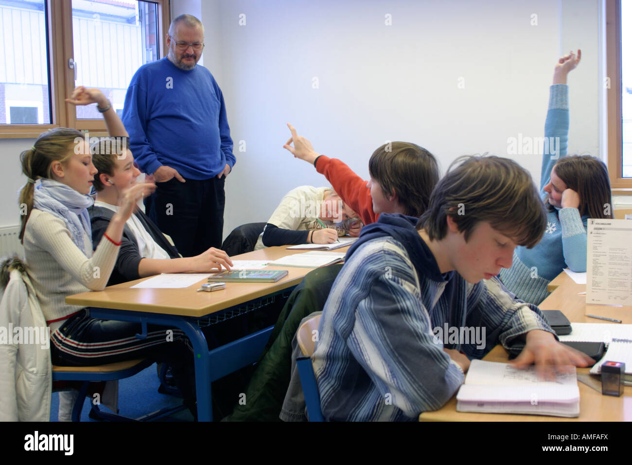 pupils and their teacher at class Stock Photo - Alamy