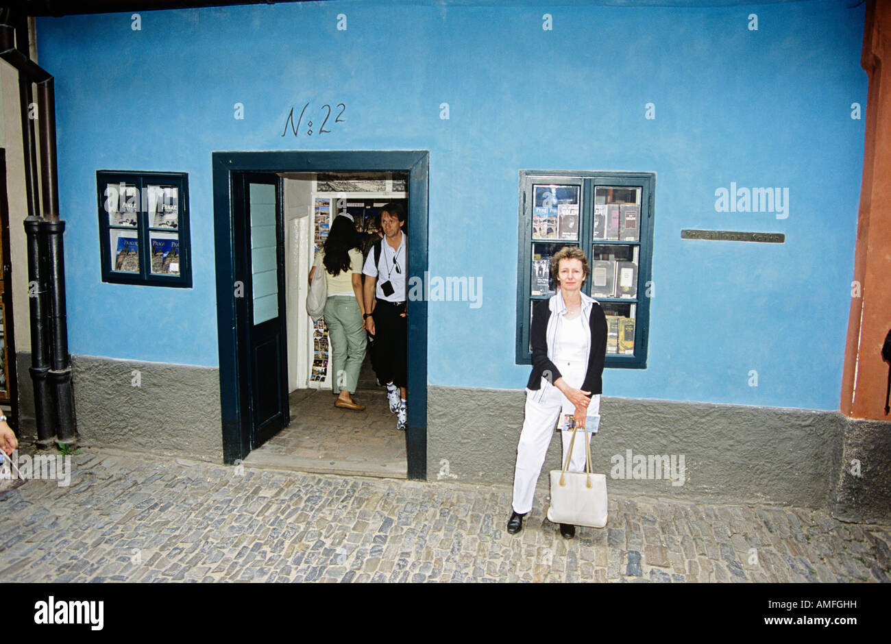 Tourist standing outside Franz Kafka’s House, Golden Lane, Prague ...
