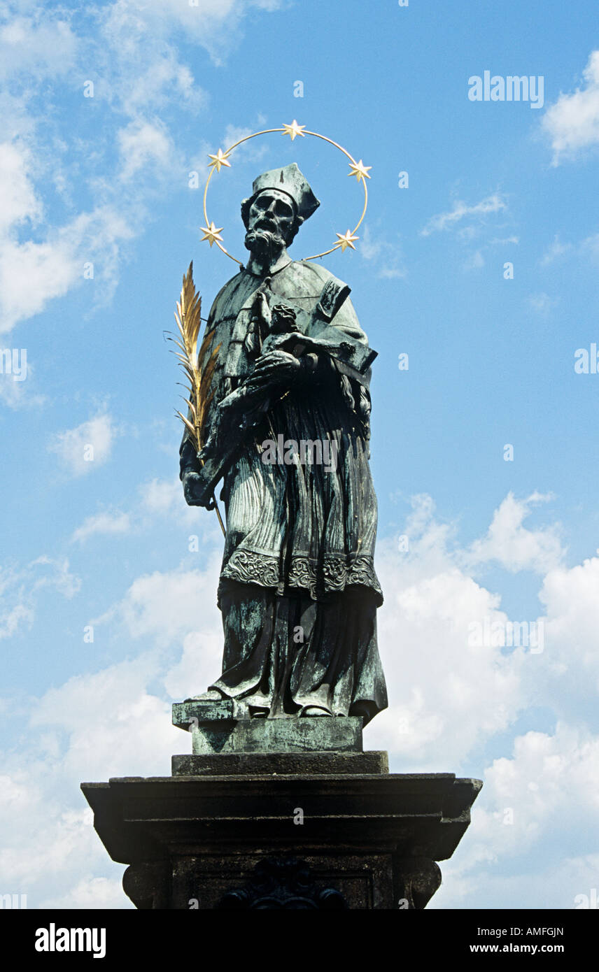 Statue of Saint John of Nepomuk holding Christ on cross, Charles Bridge ...