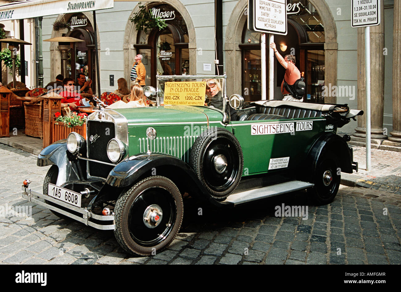 Vintage sightseeing tour car and driver, Prague, Czech Republic Stock ...