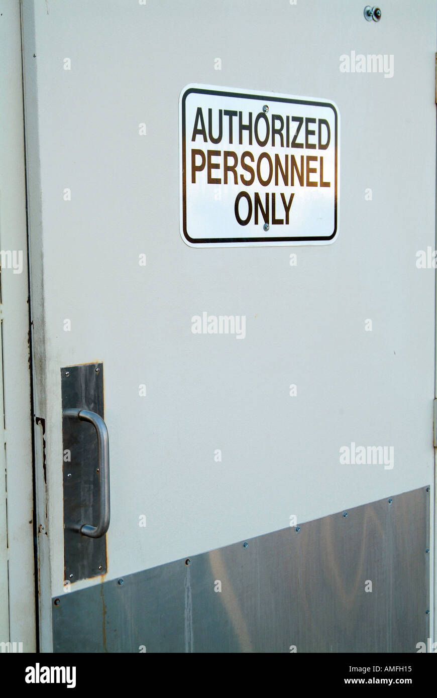 Authorized Personnel Only Sign on a door Stock Photo - Alamy
