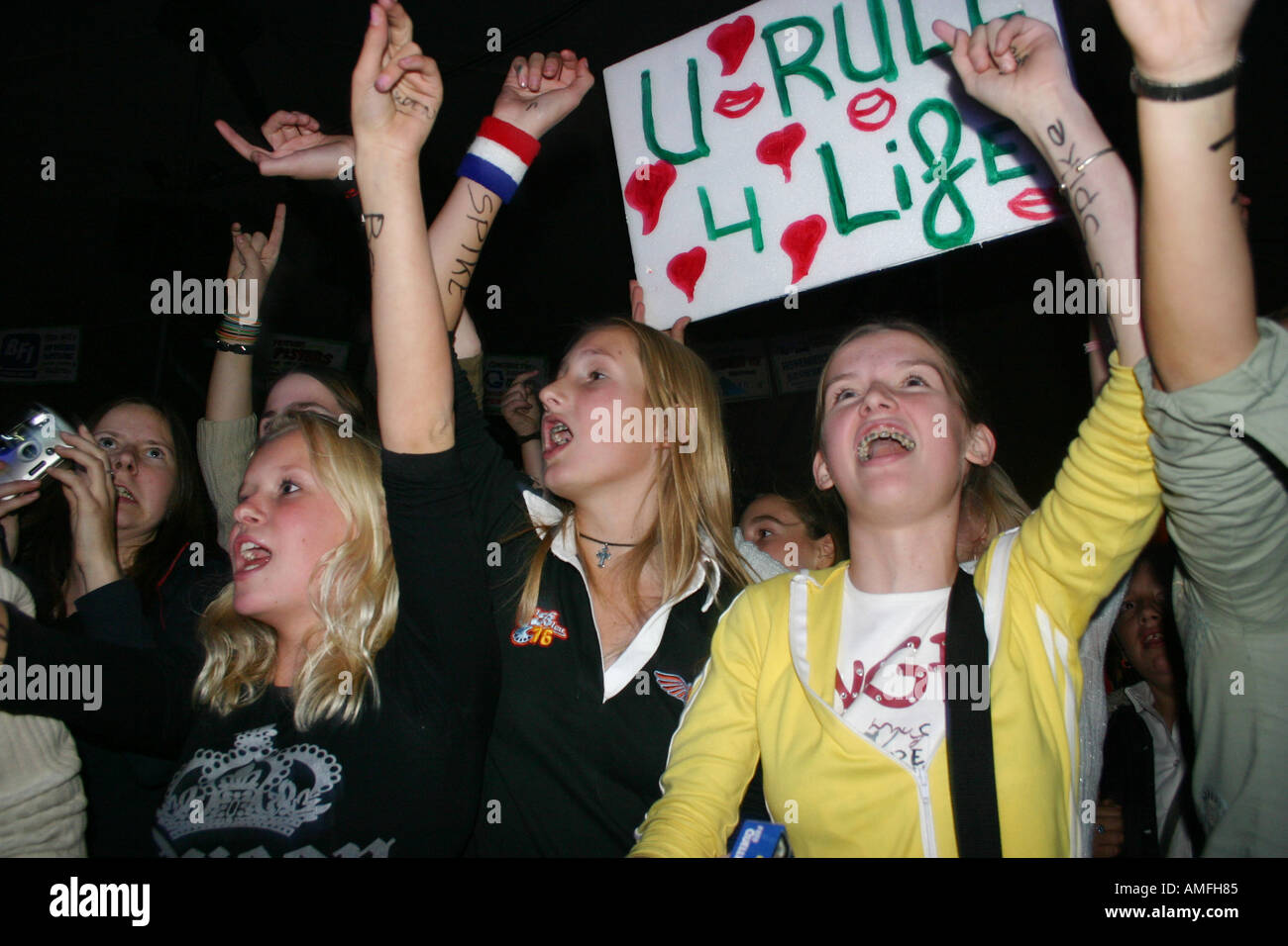 Screaming female fans of the pop group hi-res stock photography and ...