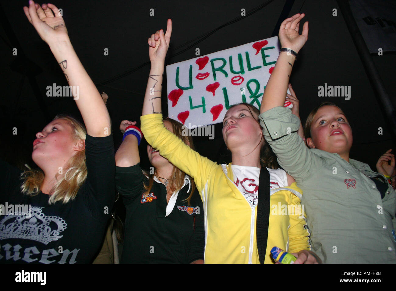 Screaming female fans of the pop group hi-res stock photography and ...
