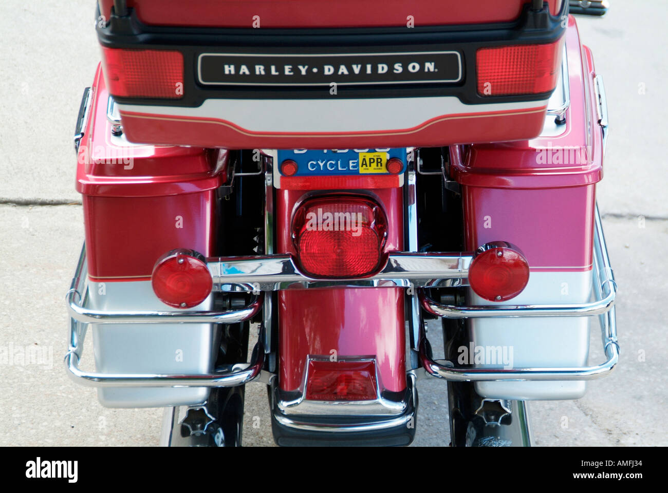 Back end of a red Harley Davidson motorcycle parked Stock Photo - Alamy