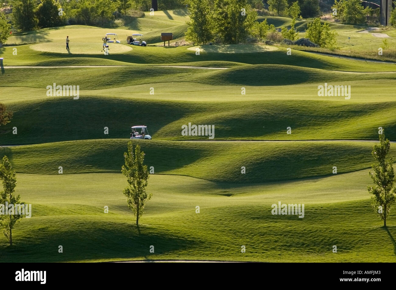 Golf course view sunset Stock Photo - Alamy